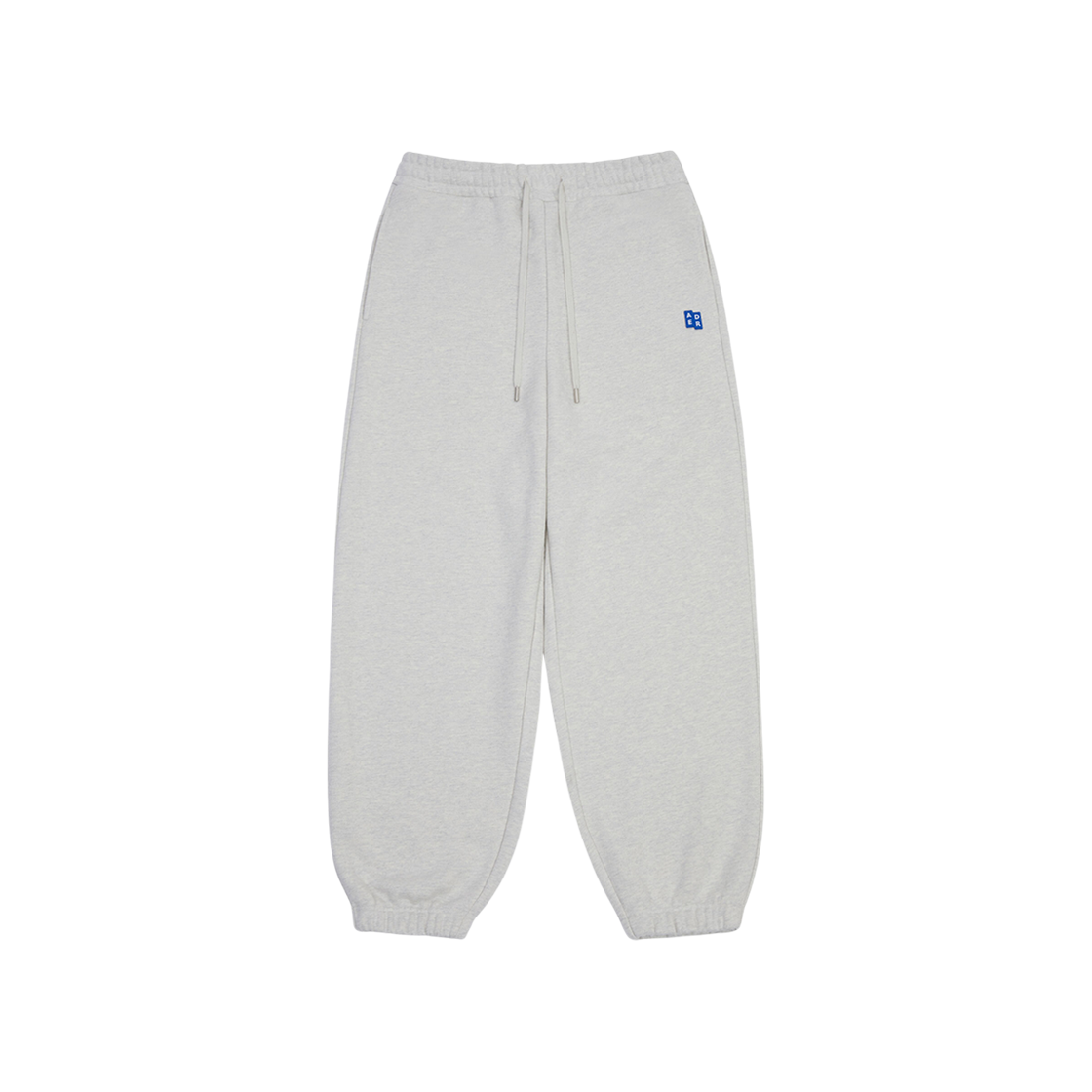 아더에러 시그니피컨트 TRS 태그 스웨트팬츠 01 오트밀 | Ader Error | KREAM
