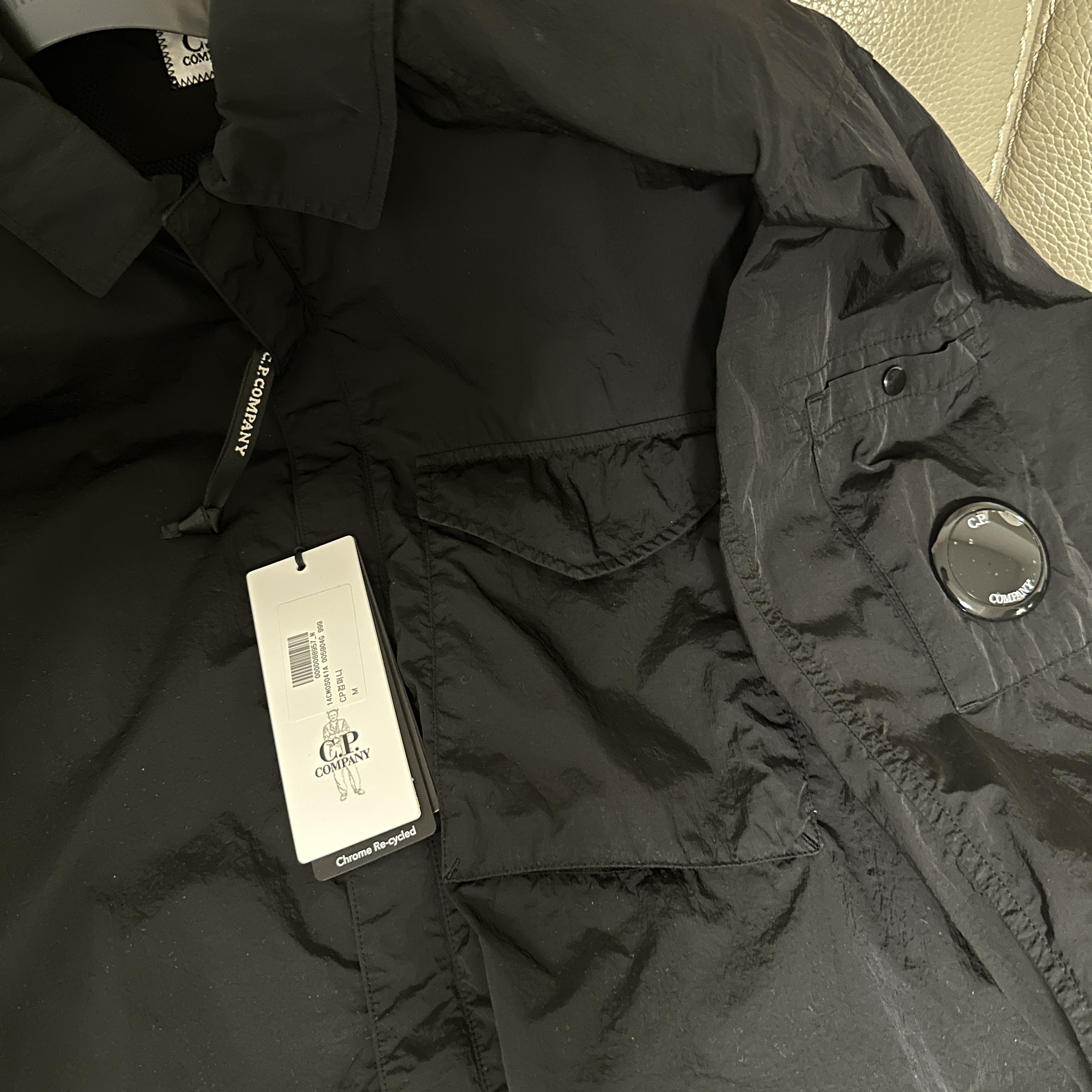 cp컴퍼니 오버셔츠 바람막이 | KREAM