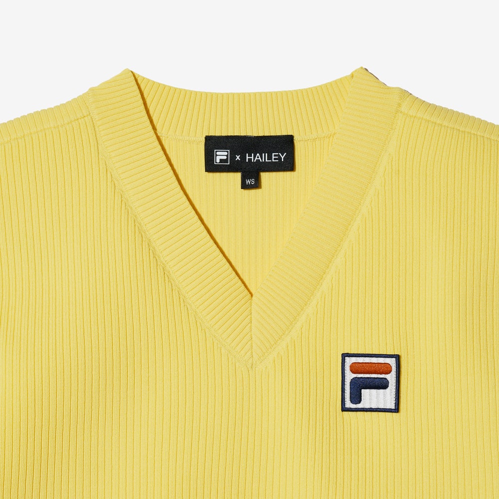 휠라 헤일리비버 V넥 니트 베스트 옐로우 | FILA | KREAM